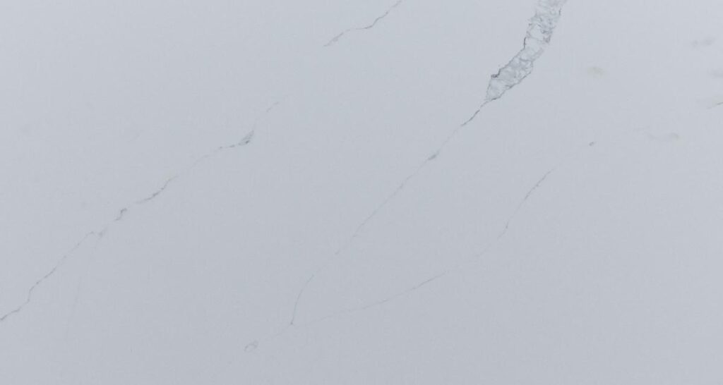 Reliance Calaccatta Oro Quartz Countertop - Kena Kitchen and Bath ...